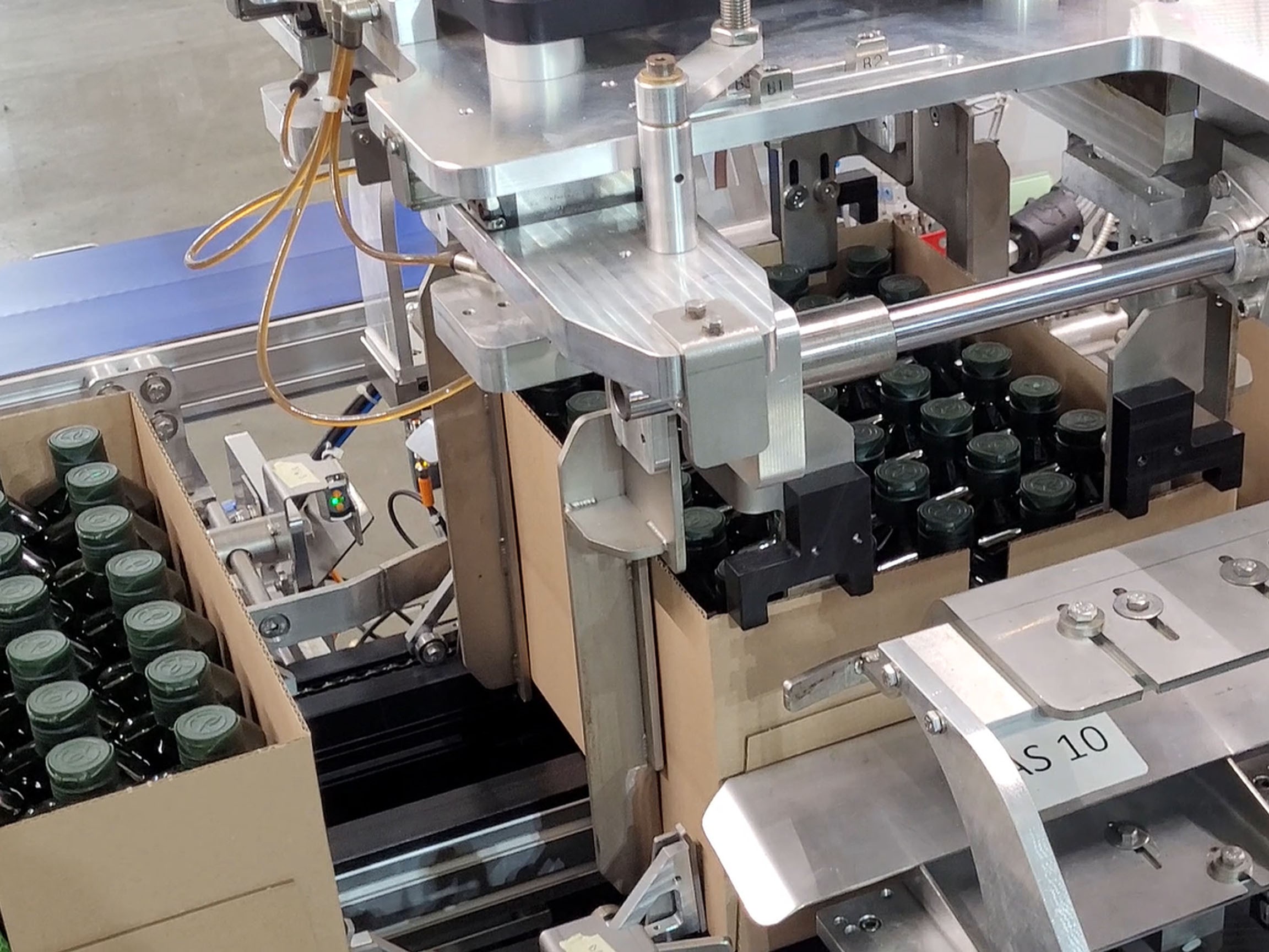 Wrap-around case packer | MG Tech